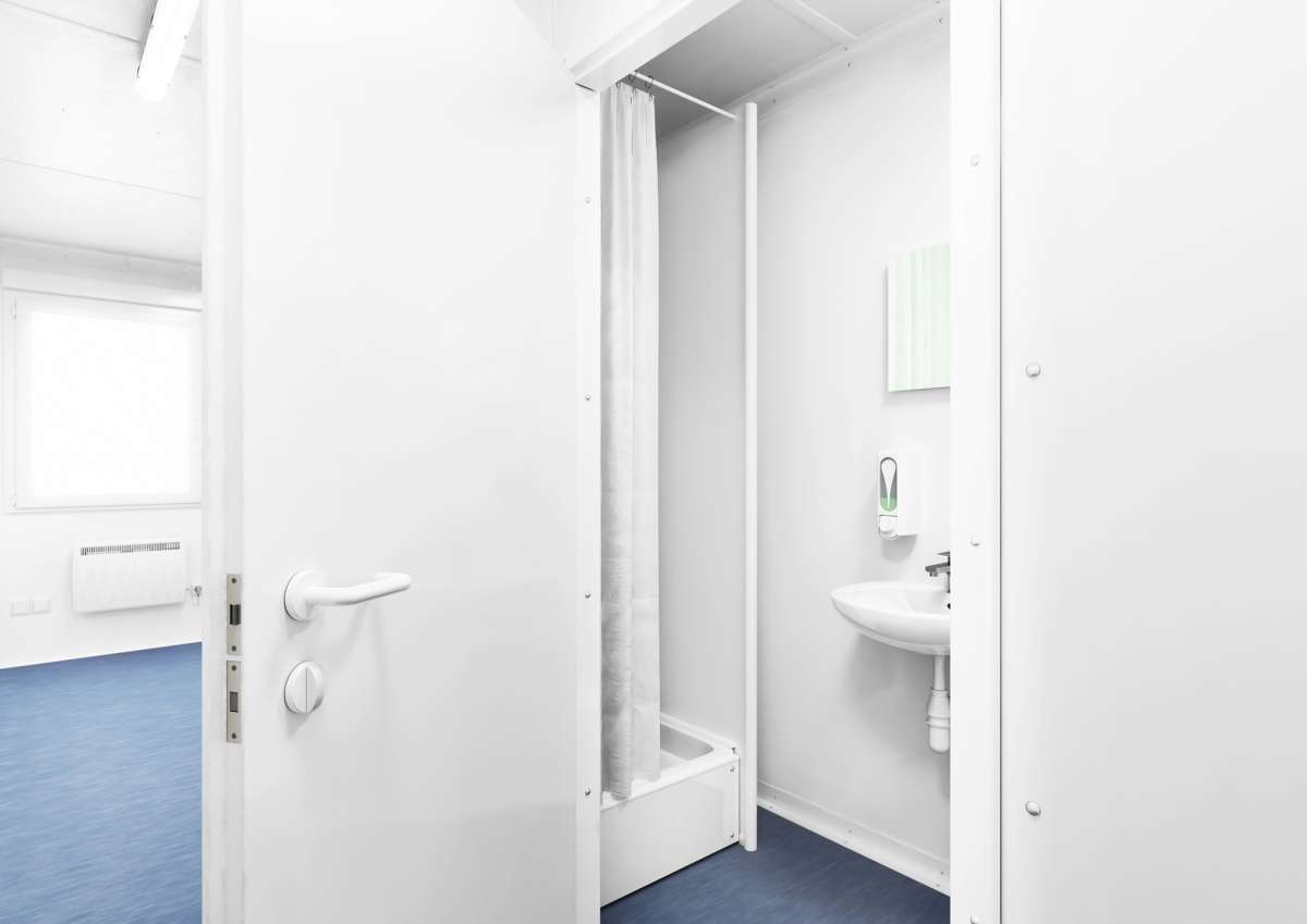 20-foot double facility: complete with vestibule, toilet and shower ...