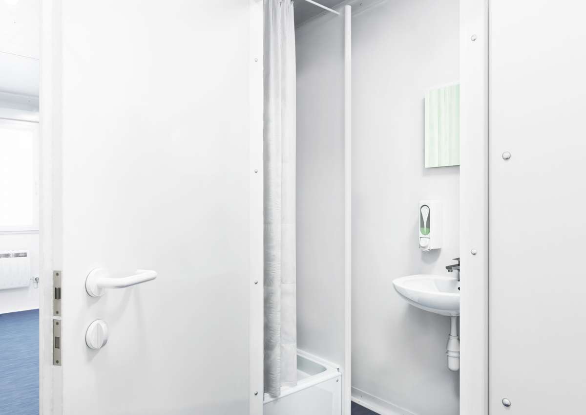 20-foot double facility: complete with vestibule, toilet and shower ...